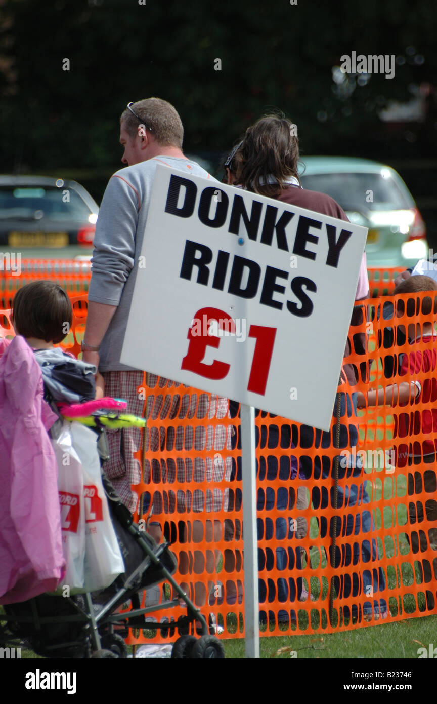 Donkey rides sign Stock Photo - Alamy
