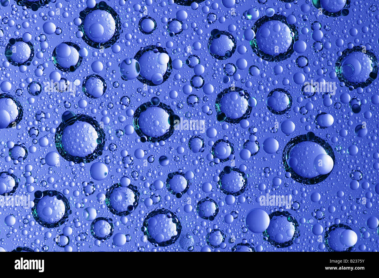 Colorful background with many drops of different sizes Stock Photo - Alamy