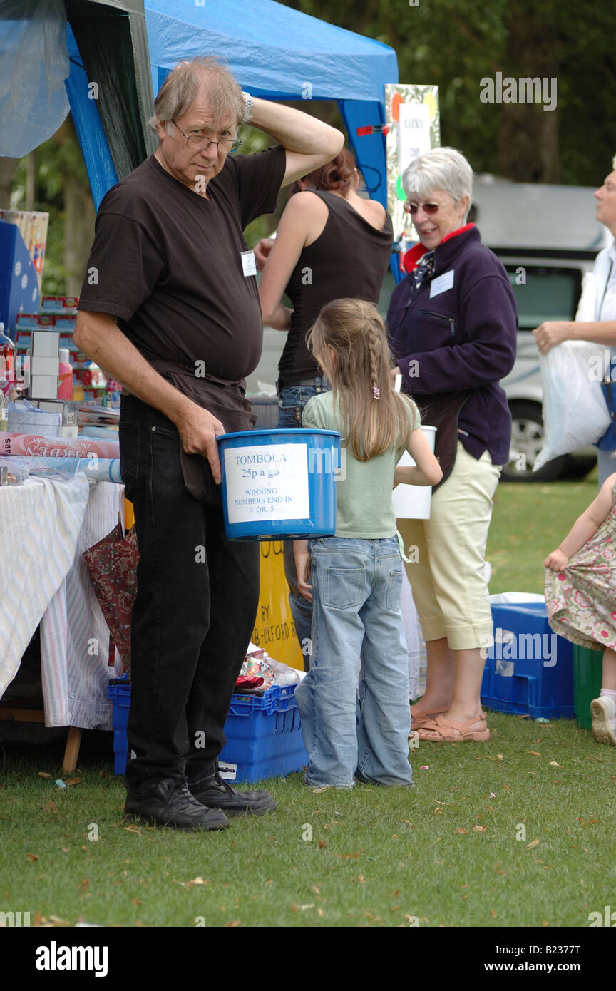 Man collecting money Stock Photo - Alamy