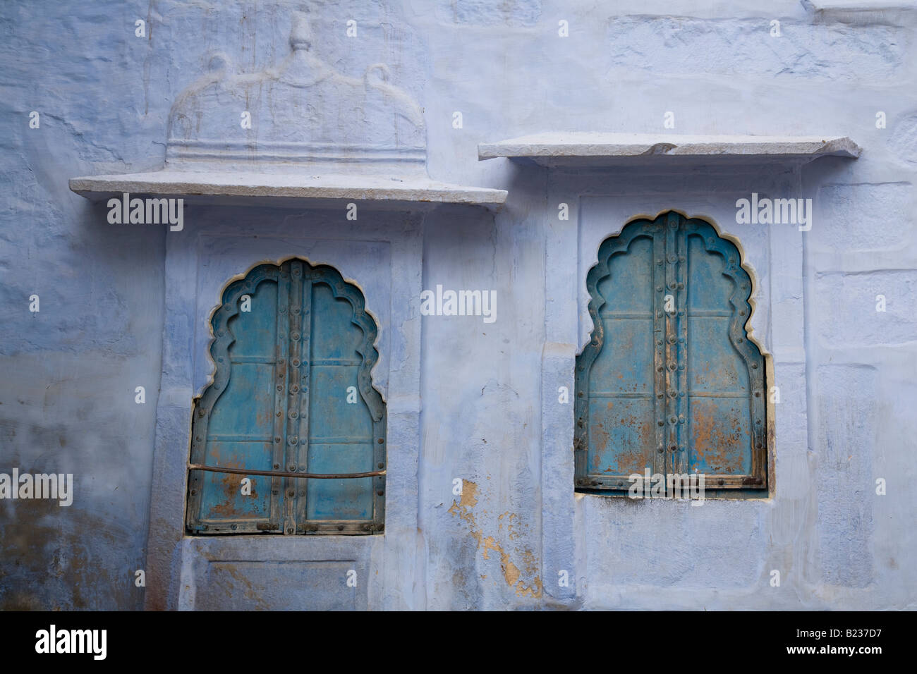 Scallop shaped shuttered windows in the blue city area of Jodhpur ...