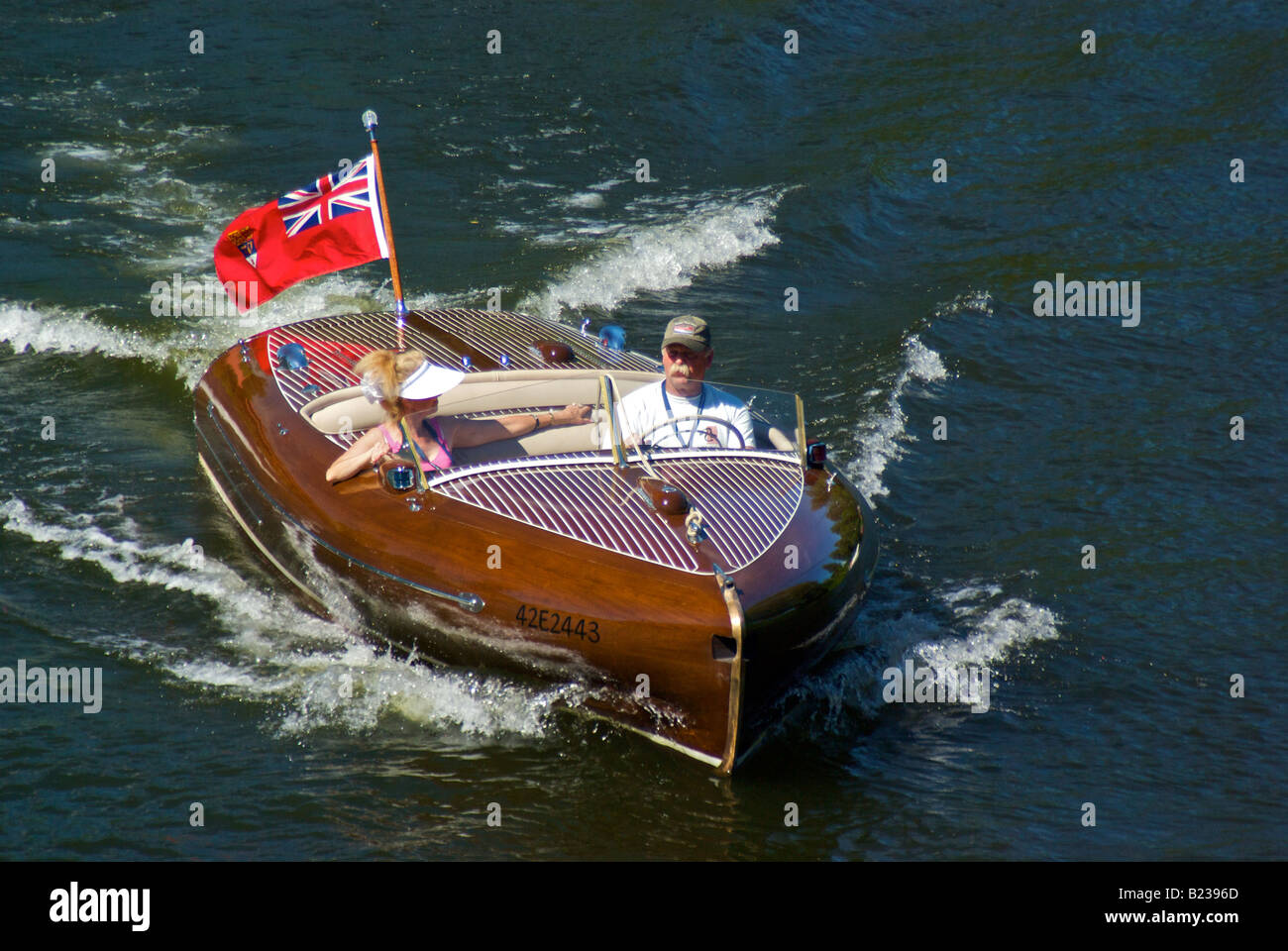 Classic antique wooden power speed boat Stock Photo - Alamy
