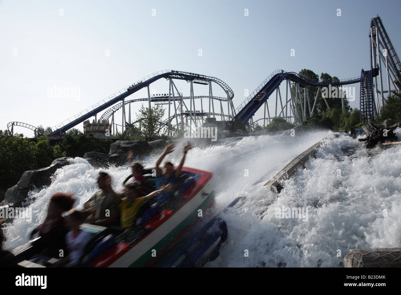 People on amusement park water ride Stock Photo - Alamy