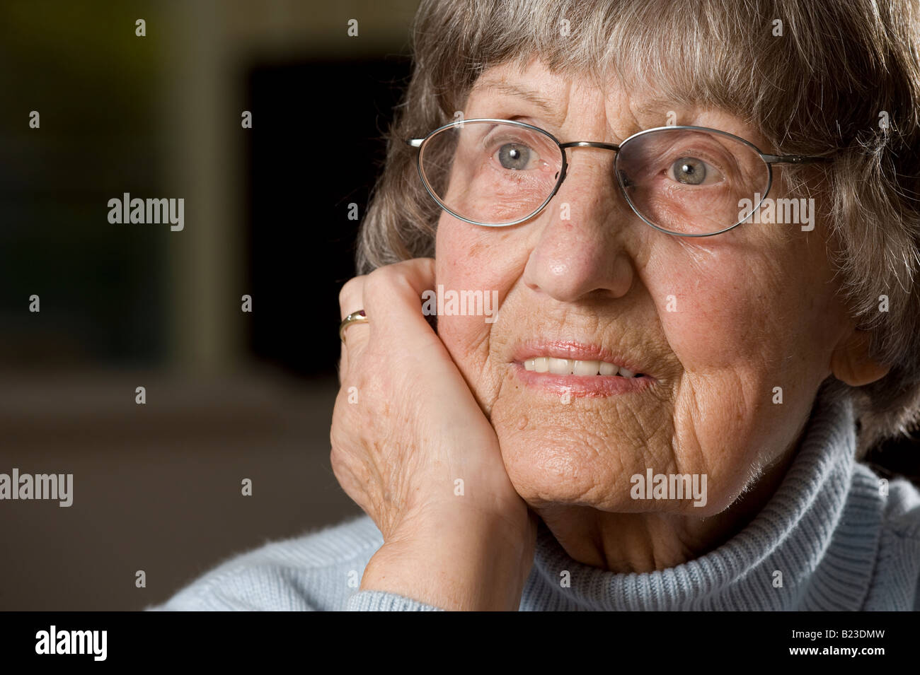 Thinking senior woman Picture made in a studio Stock Photo - Alamy