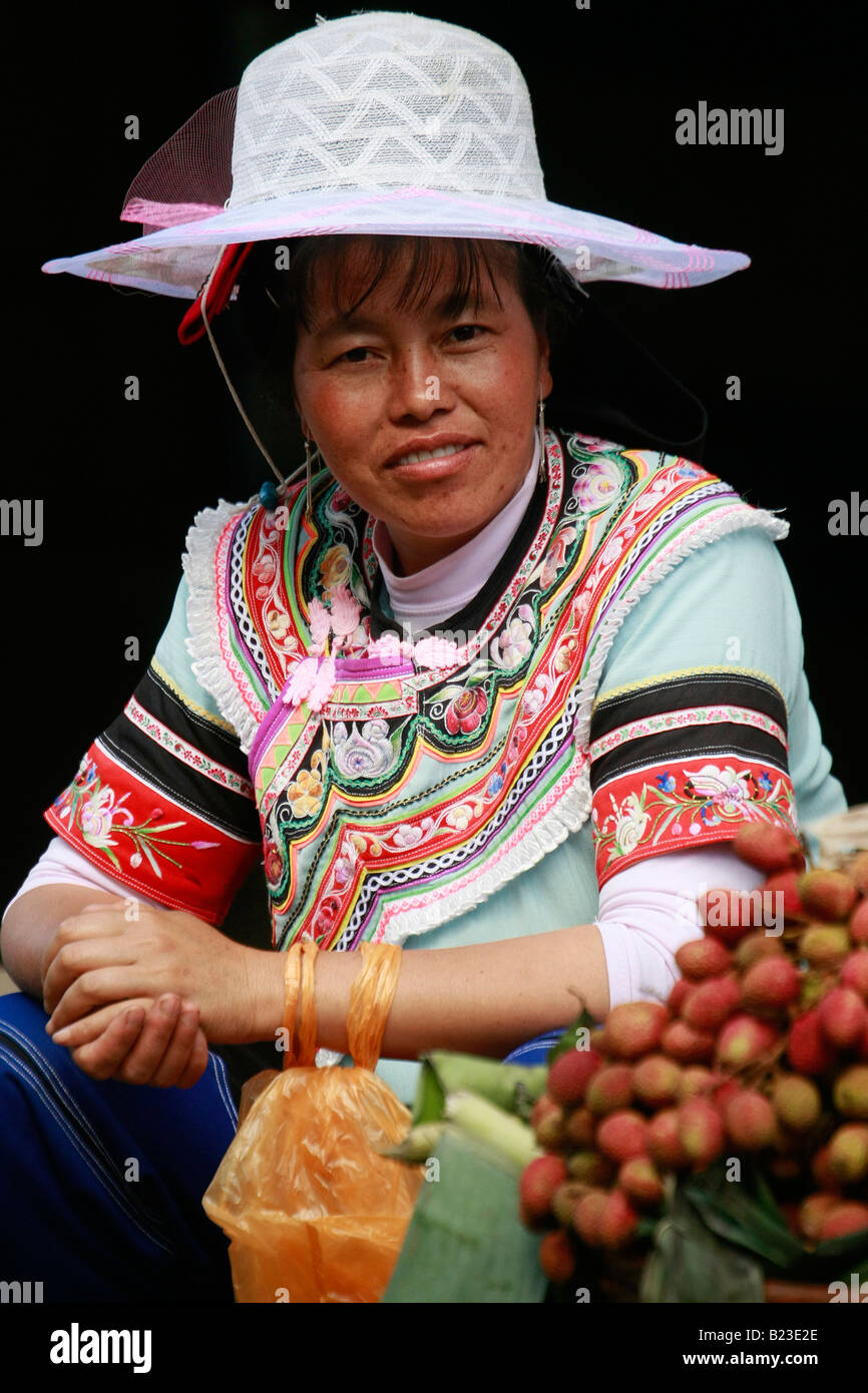Yi woman at the market in Yuanyang, Yunnan, China Stock Photo - Alamy