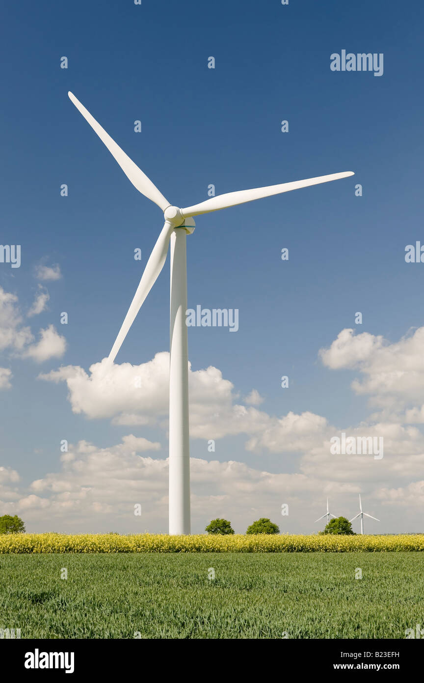 Big wind turbines in front of blue sky Stock Photo - Alamy
