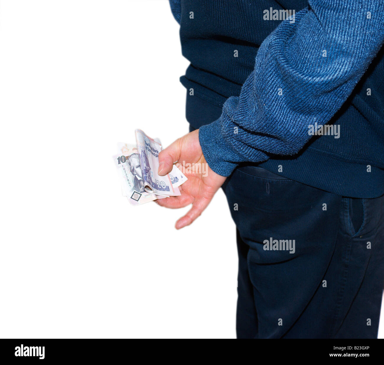 Hide money behind back hi-res stock photography and images - Alamy