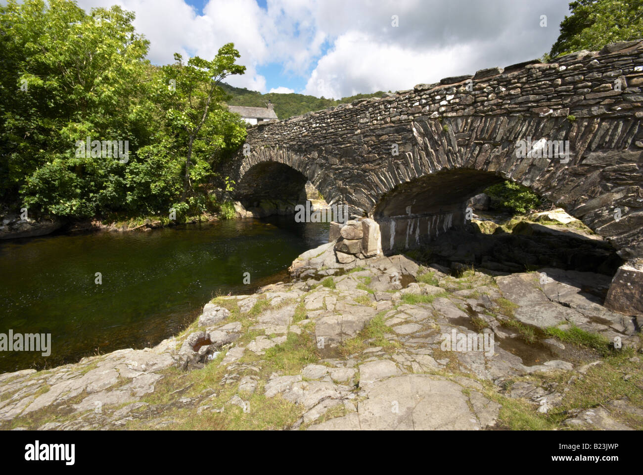 Stone Bridge and Cottage Stock Photo - Alamy