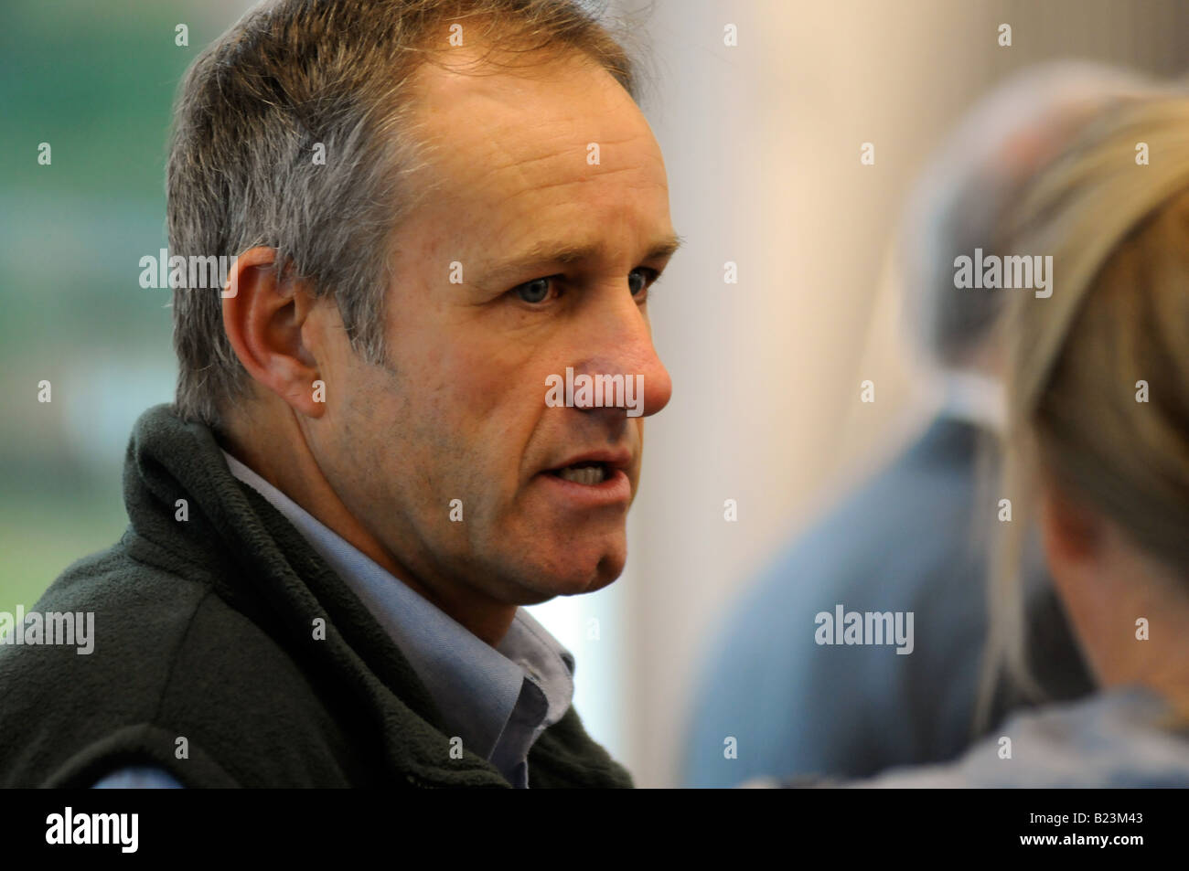 Royalty free photograph of a British business men in meeting talking in ...