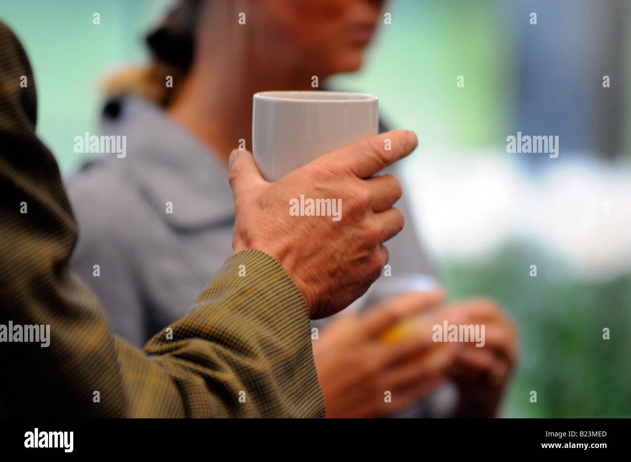 British business holding drinking tea hi-res stock photography and ...