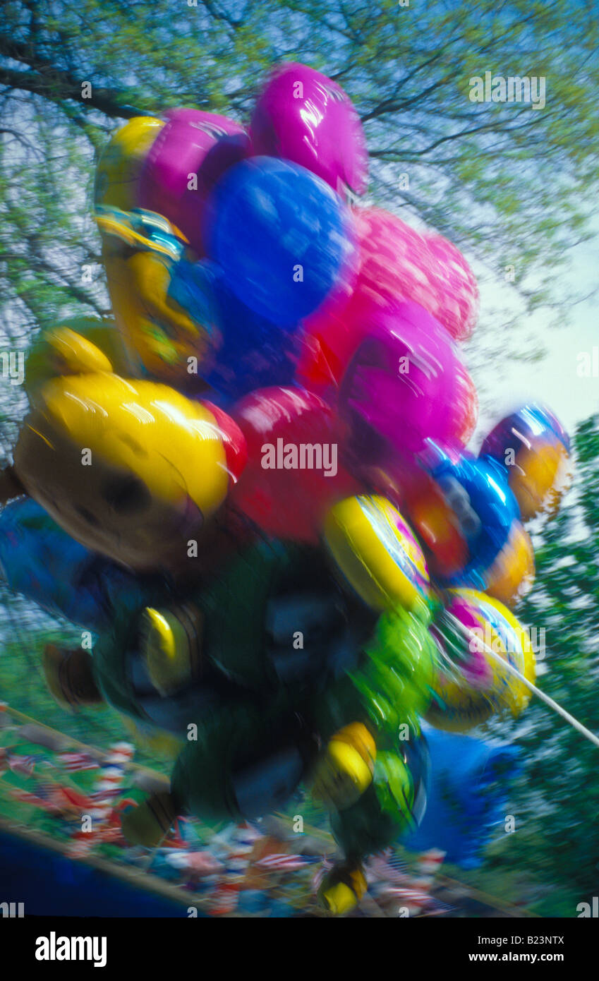 Motion soft blur assorted colorful balloons at street parade Stock ...