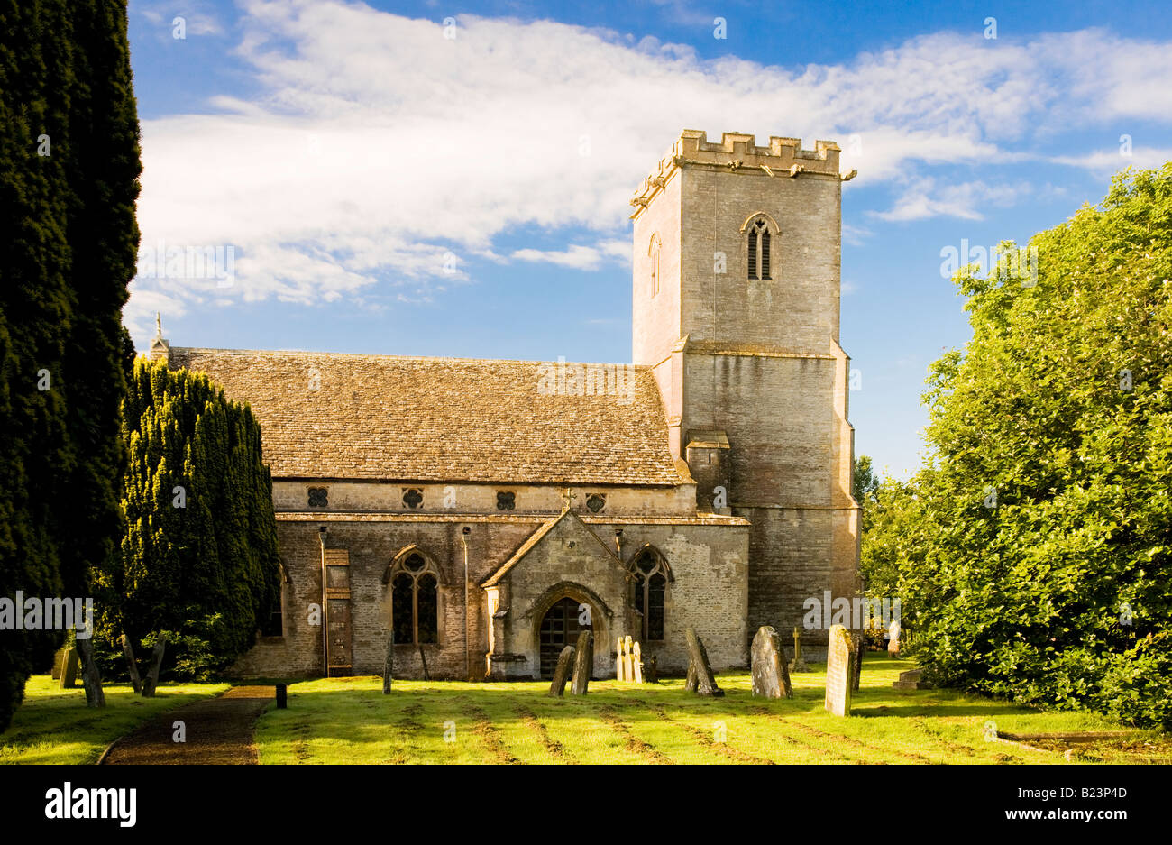 Holy Cross Church, a Norman church in the Cotswold village of Ashton ...