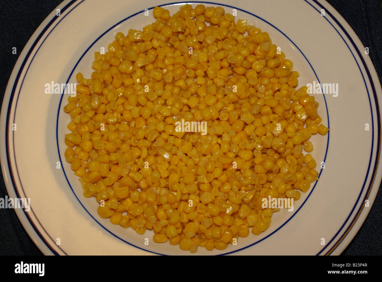 Plate with corn Stock Photo - Alamy