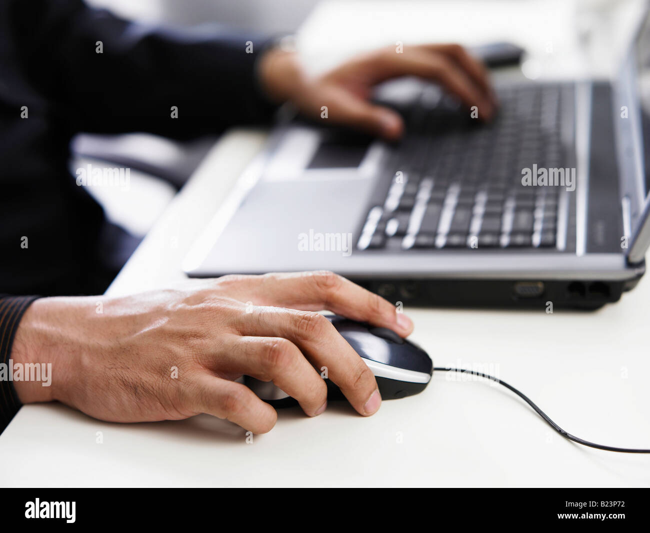 Computer mice and hands hi-res stock photography and images - Alamy
