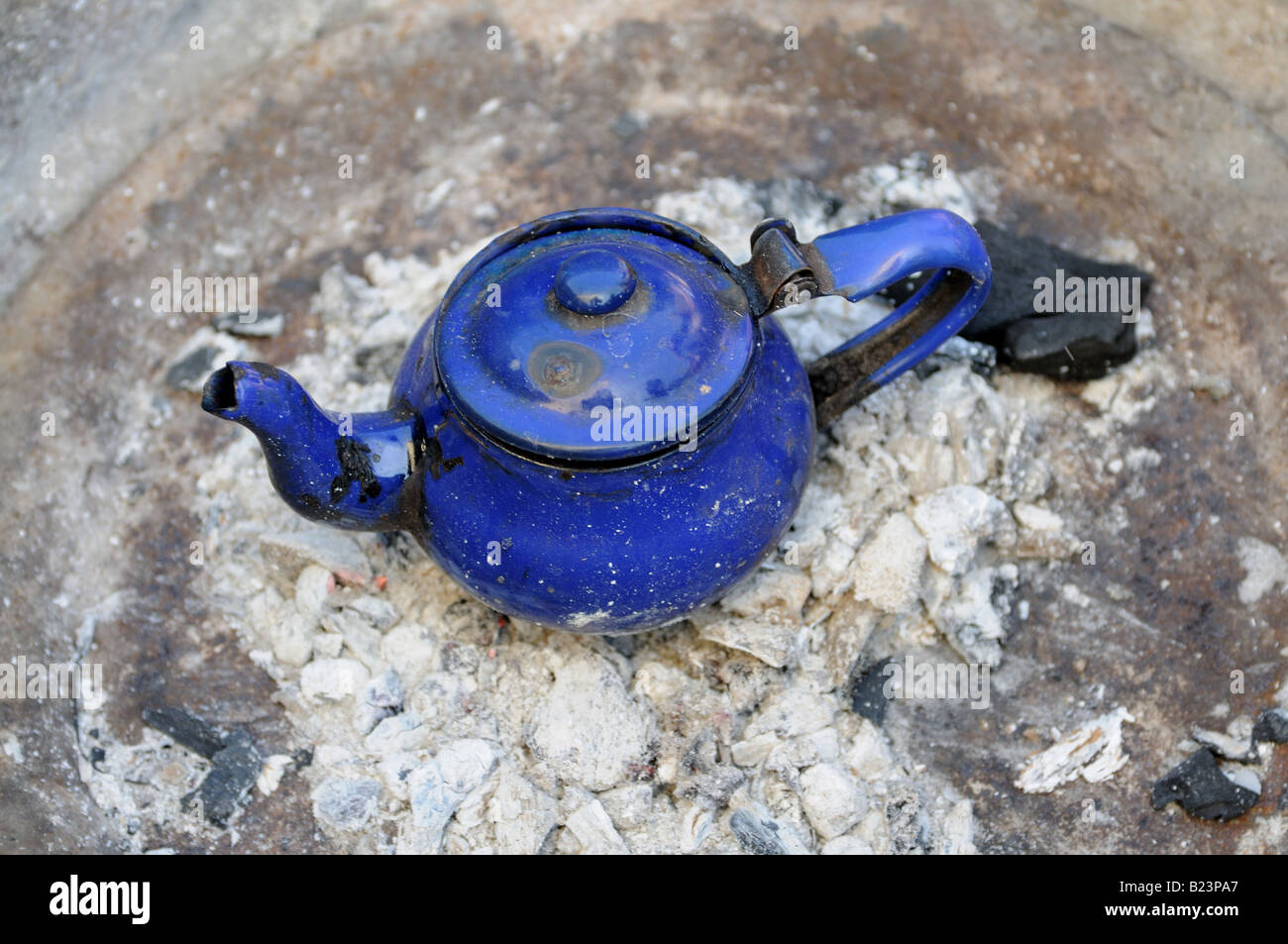 Blue Tea pot on a stove on a sailing boat Western Africa Mauritania ...