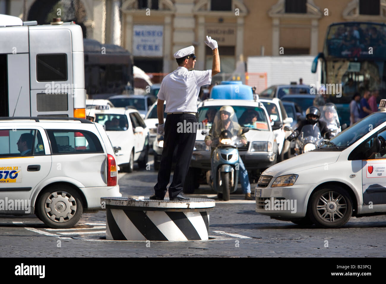 Traffic policeman directing traffic in Rome Italy Stock Photo - Alamy
