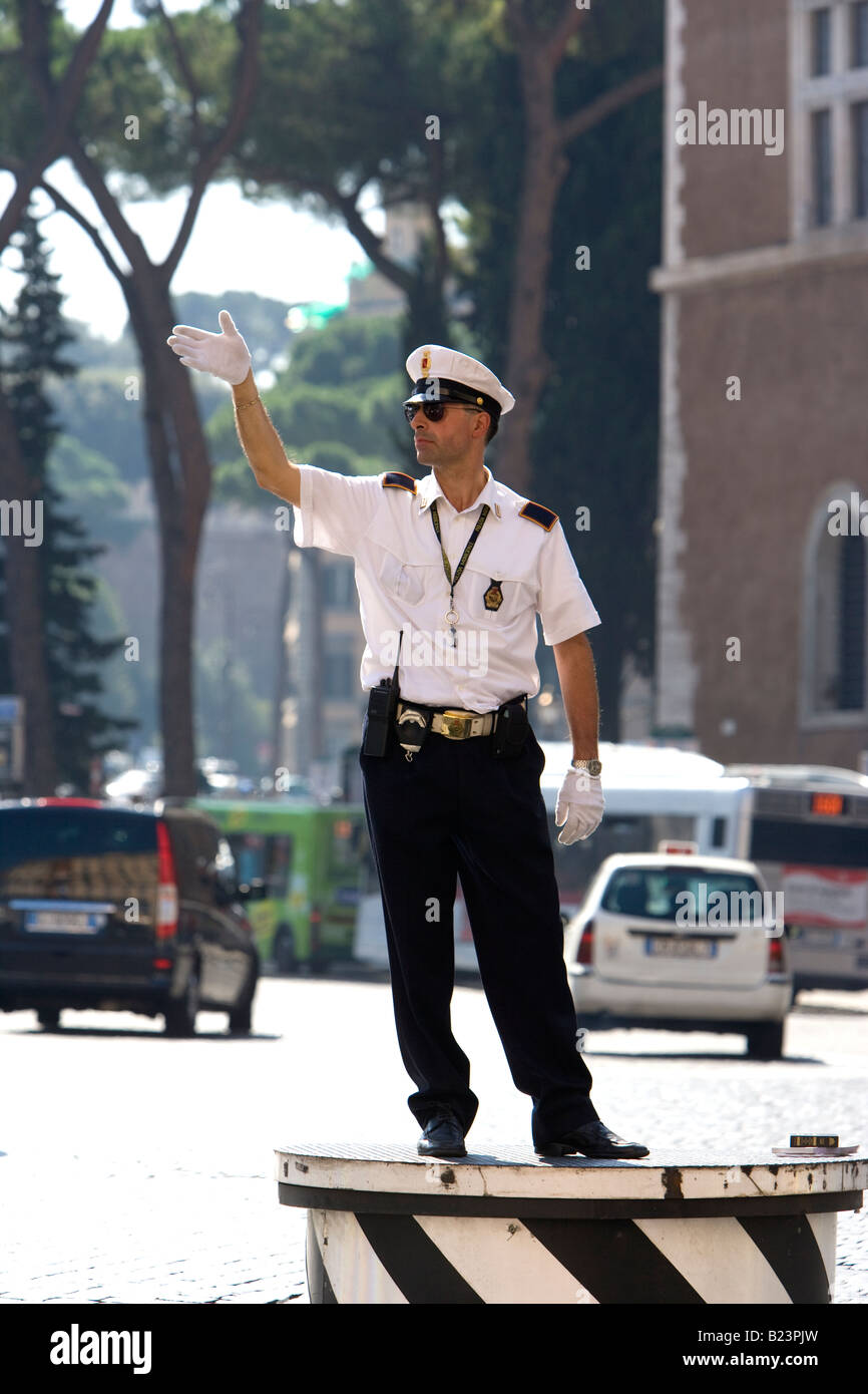 Traffic policeman directing traffic in Rome Italy Stock Photo - Alamy