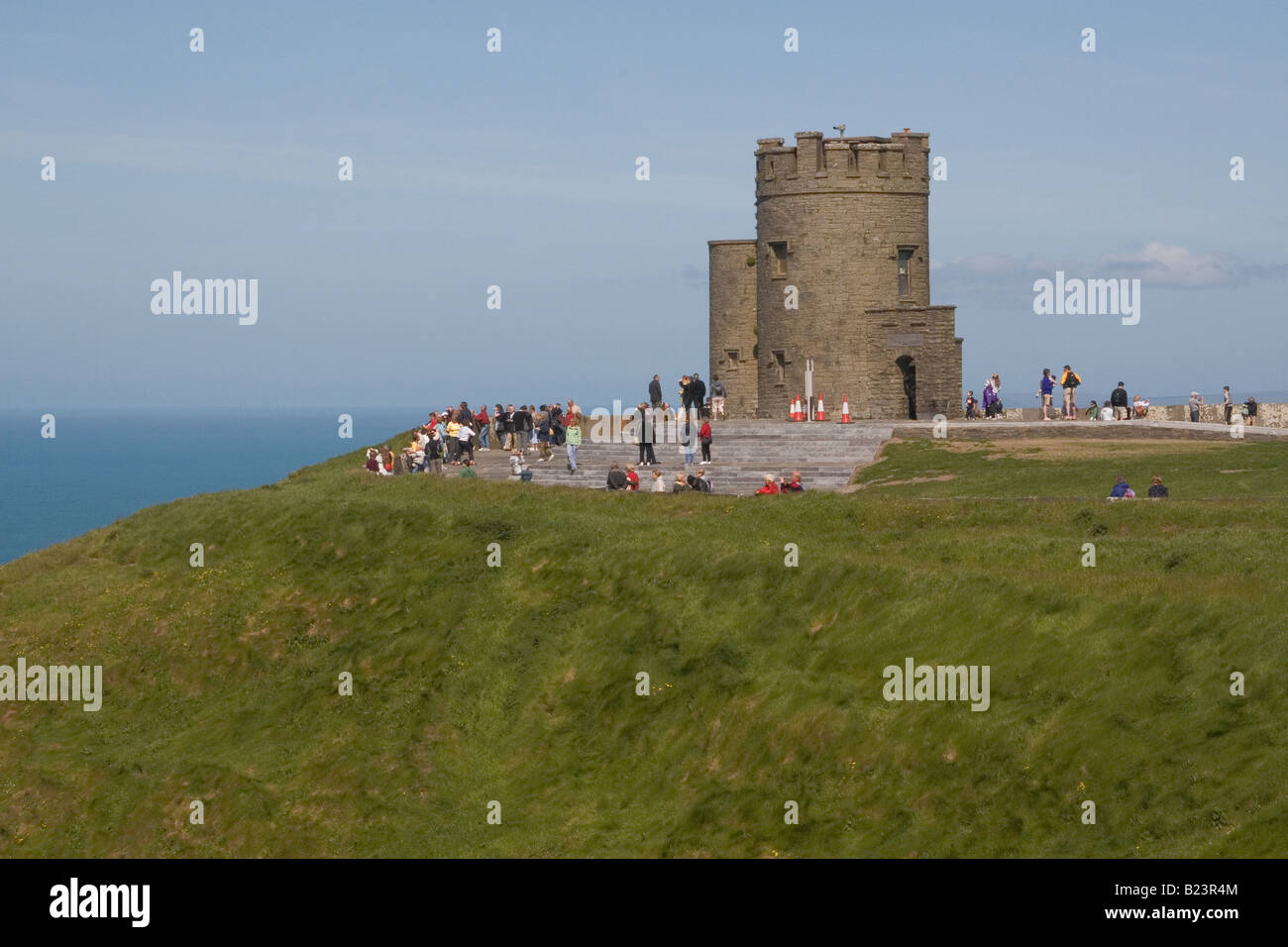 Vistors views the Cliffs of Moher from O'Brien's Tower Stock Photo - Alamy