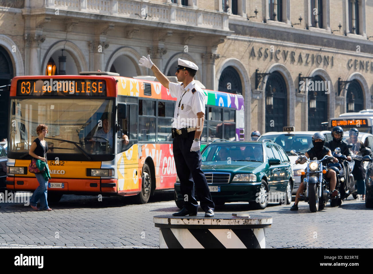 Traffic policeman directing traffic in Rome Italy Stock Photo - Alamy