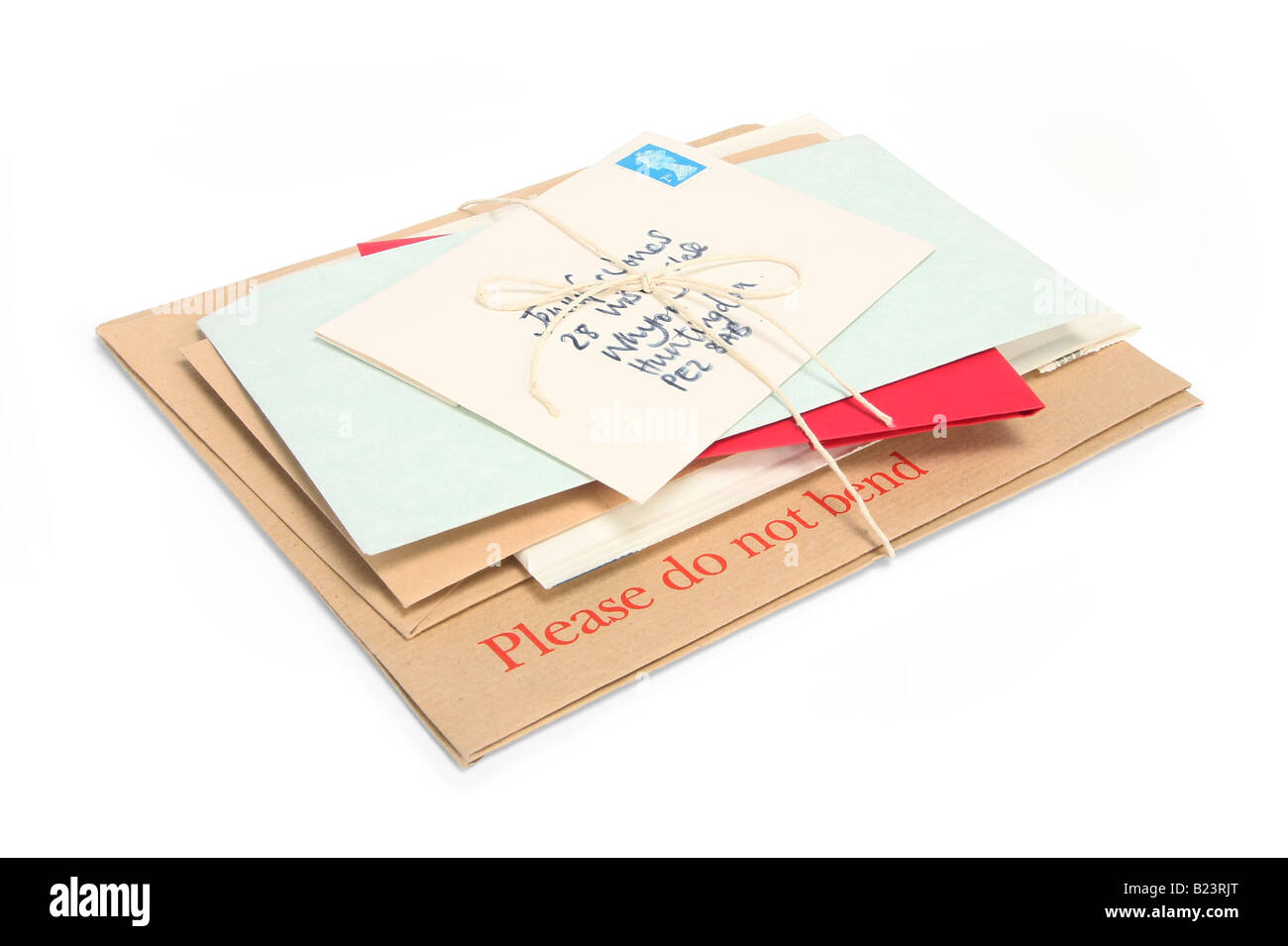 pile of letters on a white background Stock Photo - Alamy