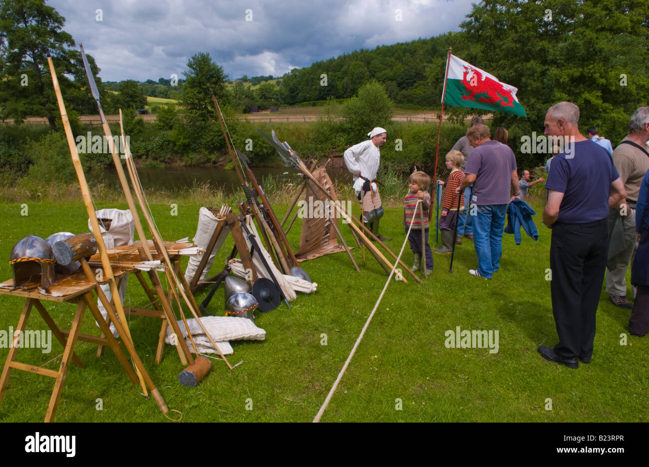 Visitors looking at display of weapons at Skenfrith Medieval Fun Day ...