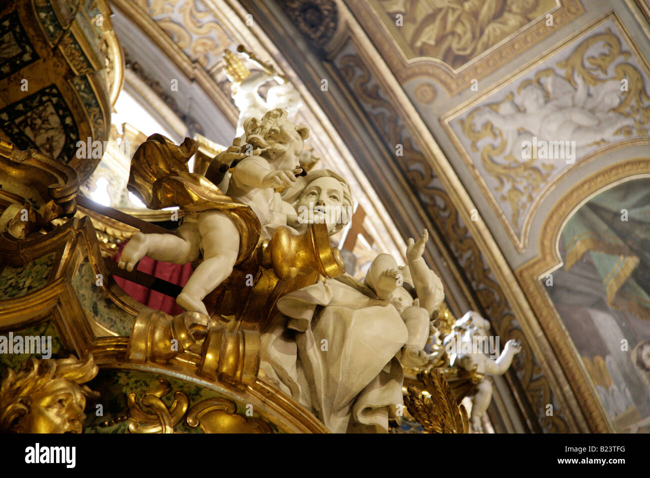 cherubins and serafins angels over organ in Saint Mary Magdalene Rome ...
