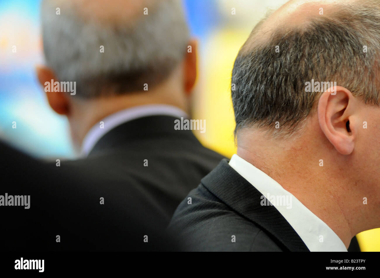 Royalty free photograph of a British business men in meeting talking in ...