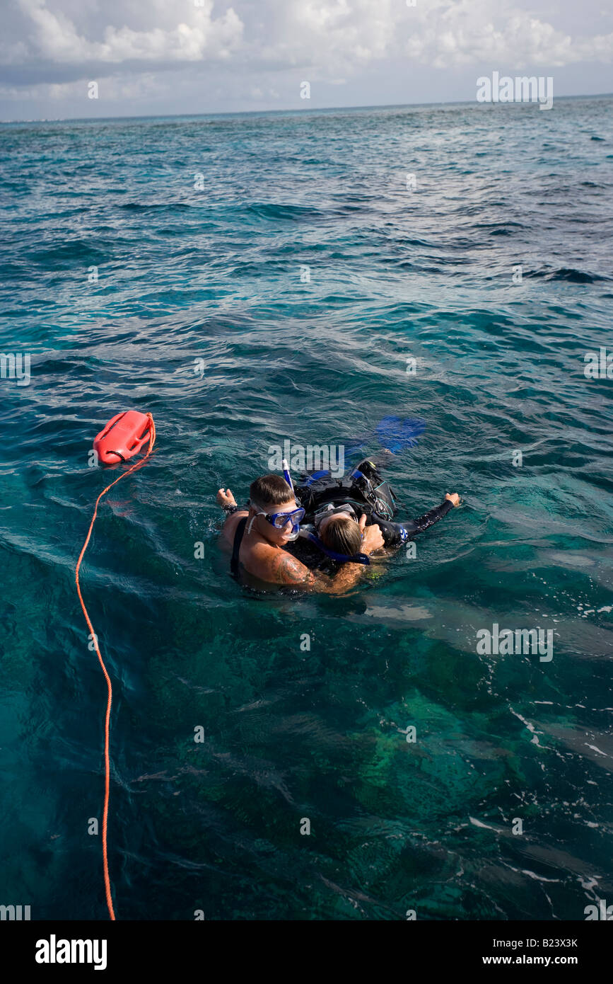 Rescue scenario with scuba diver Stock Photo - Alamy