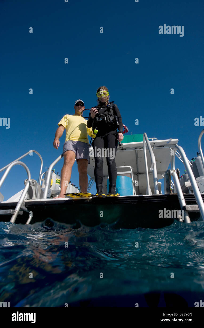 Scuba diver preparing for giant stride entry Stock Photo - Alamy