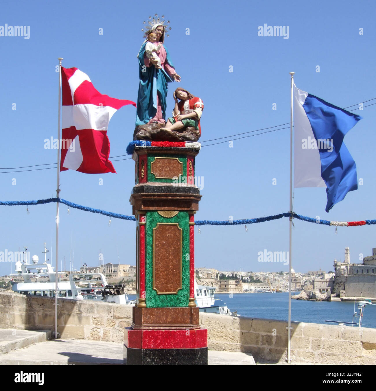 Effigy of The Virgin Mary and flags prepared for a Festa in Valletta ...