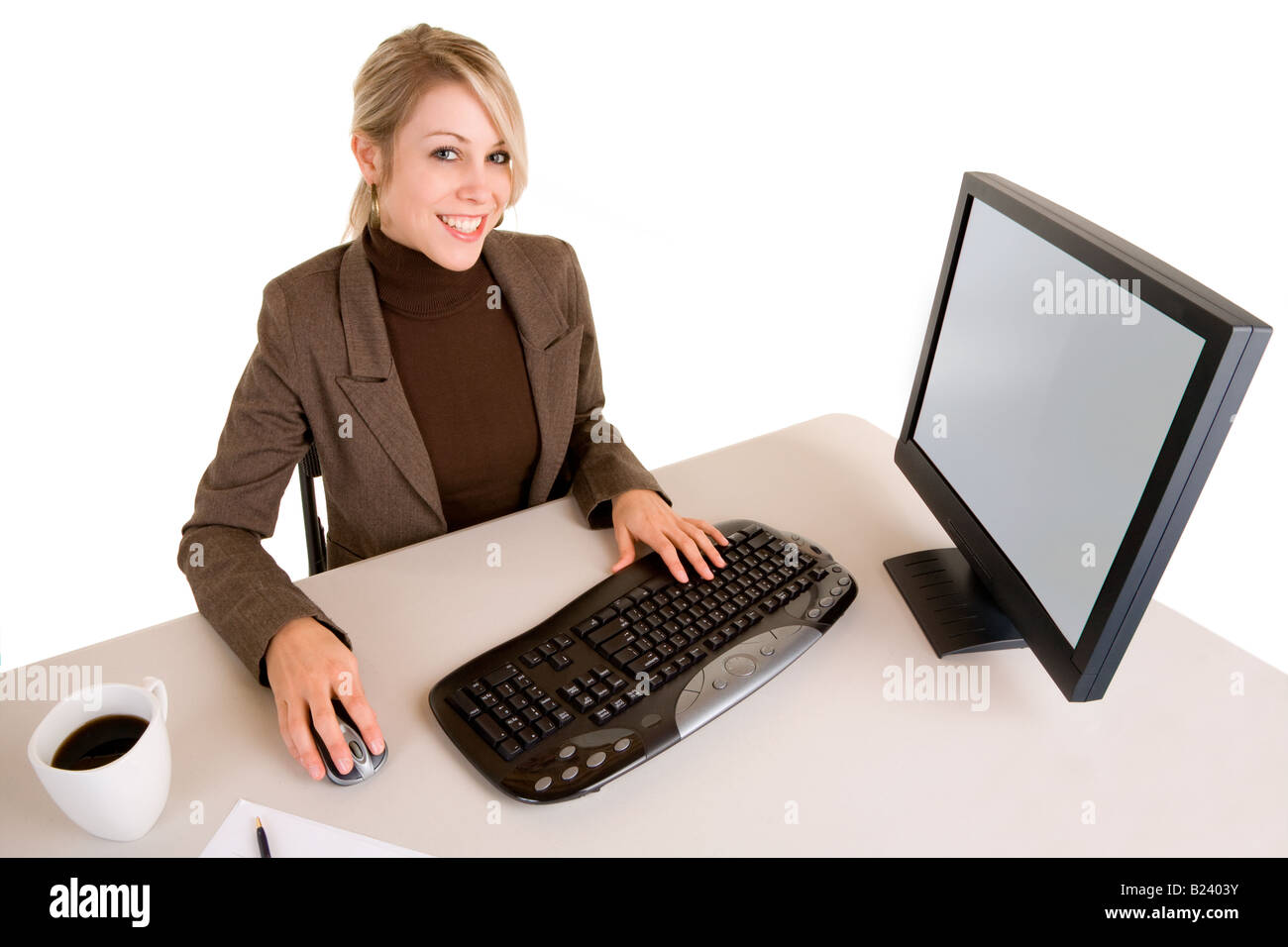 Attractive blonde secretary sitting desk hi-res stock photography and ...