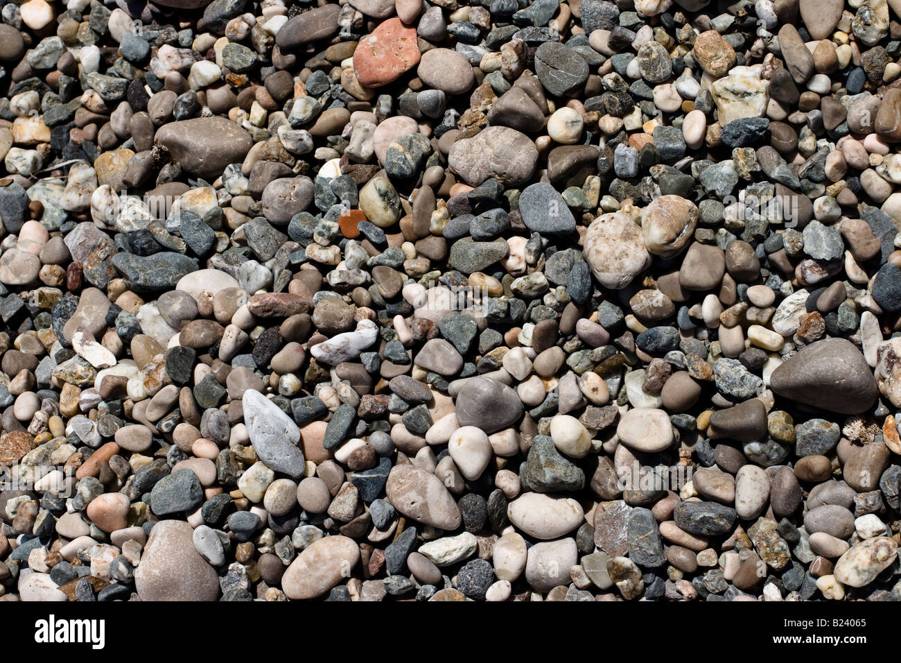Stones shaped by the Mediterranean sea waves making an abstract pattern ...