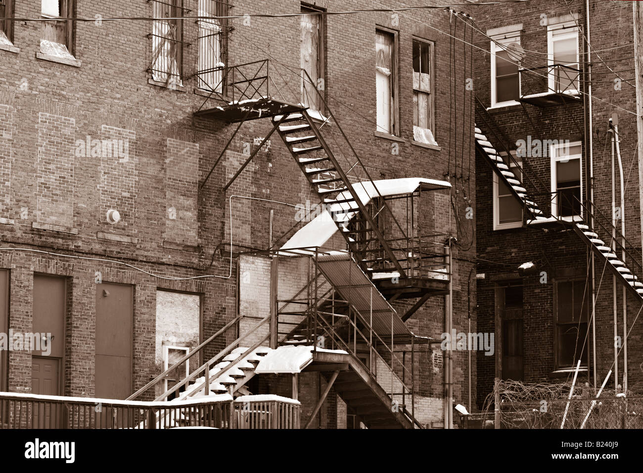 Cityscape of adjacent brick buildings at right angles to each other ...