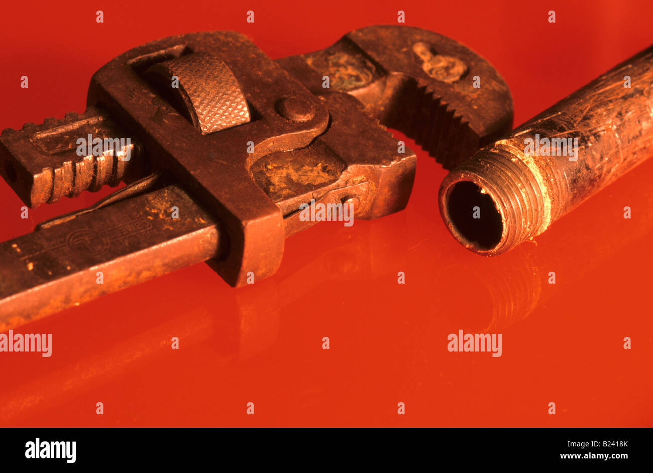 Wrench and pipe Stock Photo - Alamy