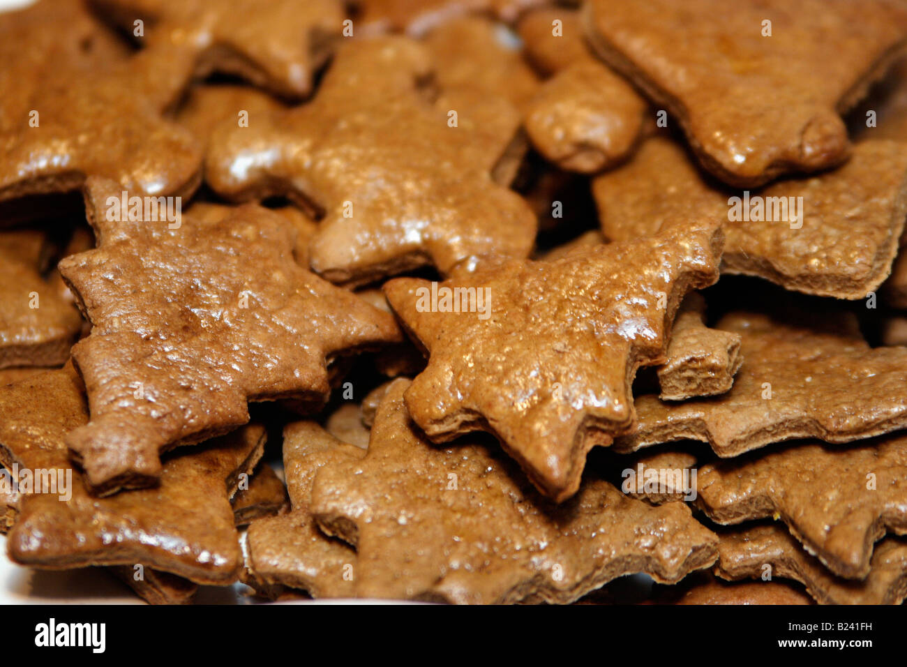 Christmas gingerbread cookies baked on a table overhead from above ...