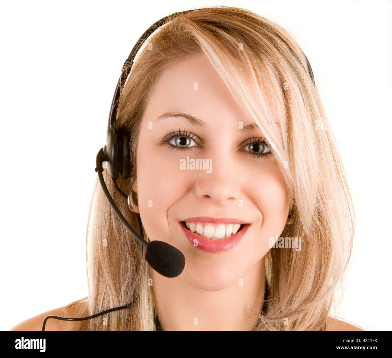 A beautiful smiling girl is wearing a headset Stock Photo - Alamy