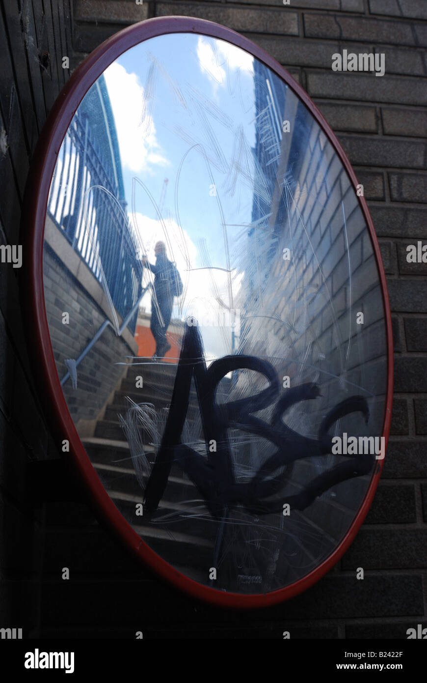 Convex mirror with graffiti, reflecting stairs Stock Photo - Alamy