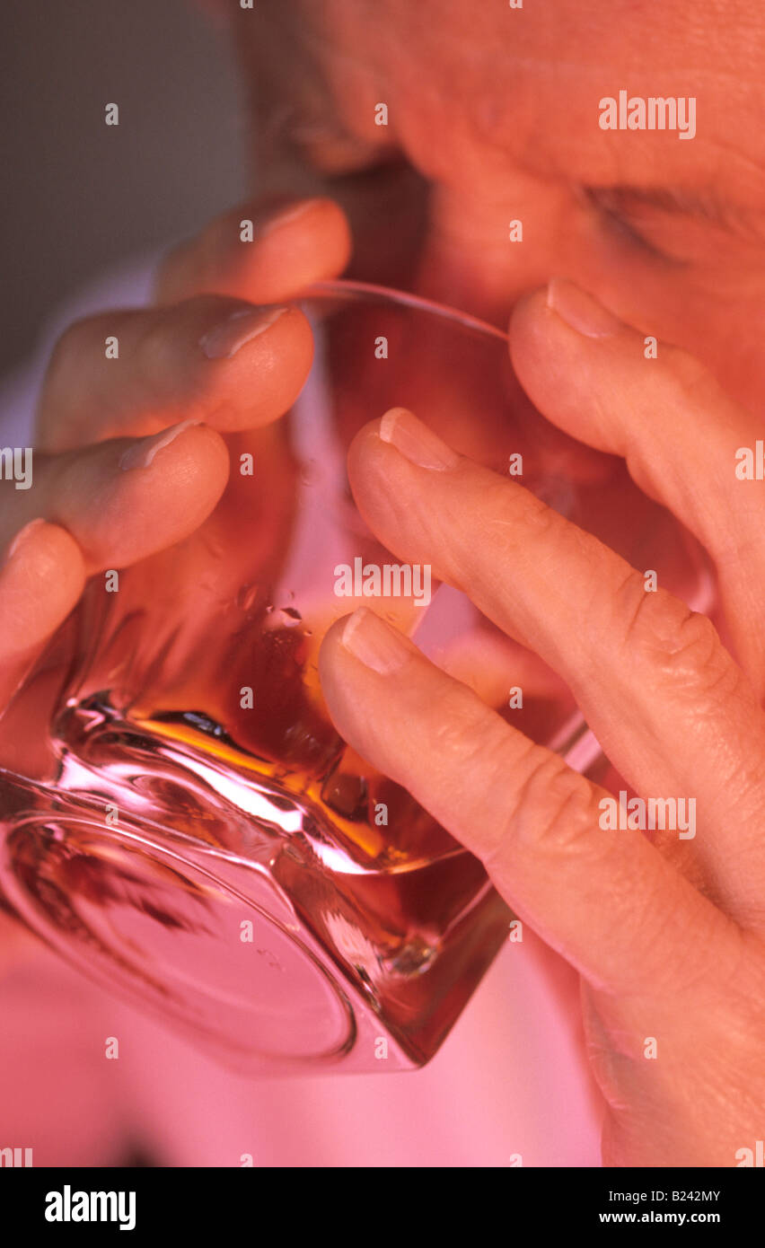 MAN DRINKING LIQUOR ALCOHOL CONSUMPTION Stock Photo - Alamy