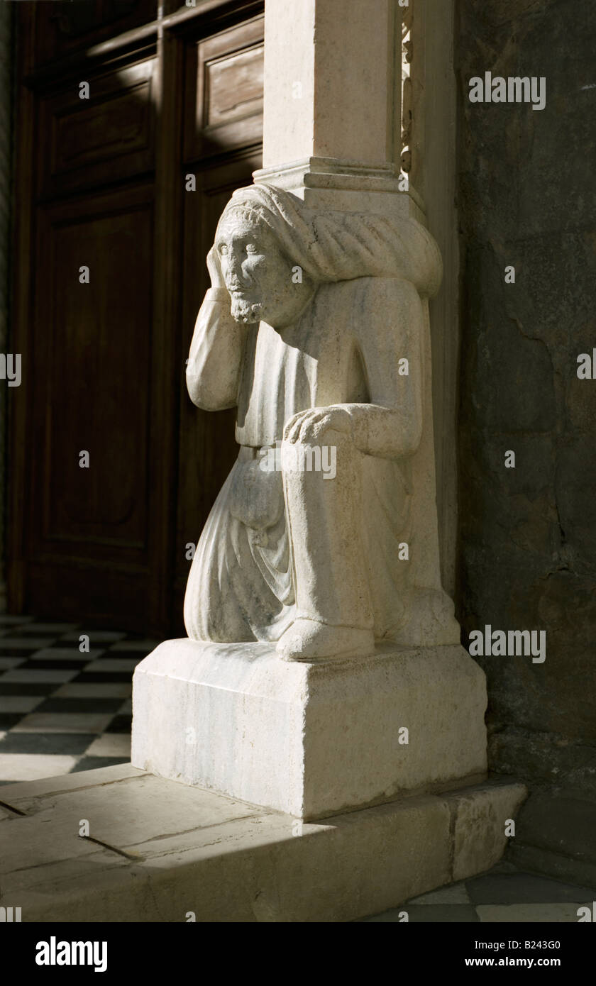 Romanesque statue at the entrance of Santa Maria Maggiore Stock Photo ...