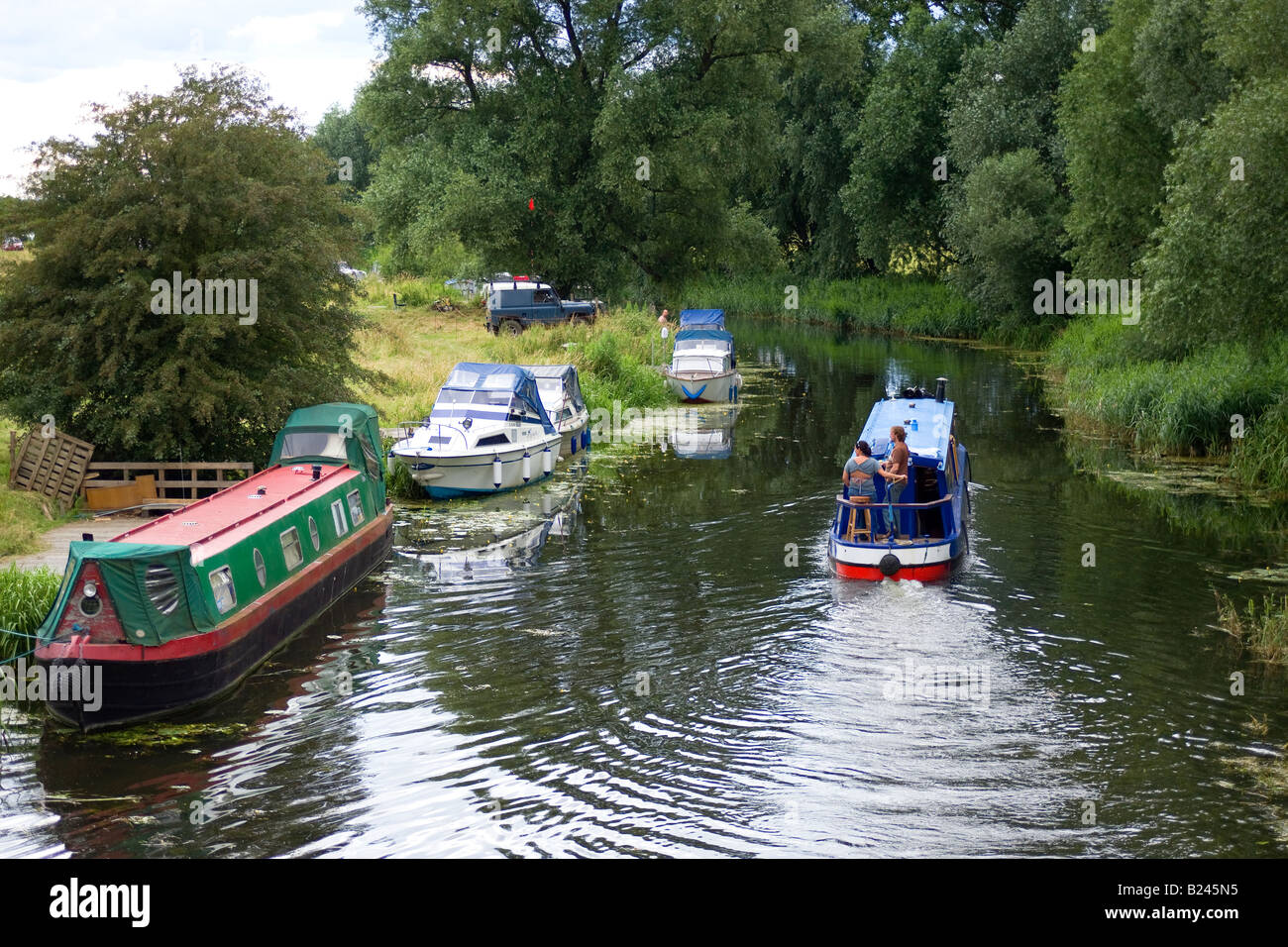 Long boats on the River Wissey "South Norfolk" UK Stock Photo - Alamy