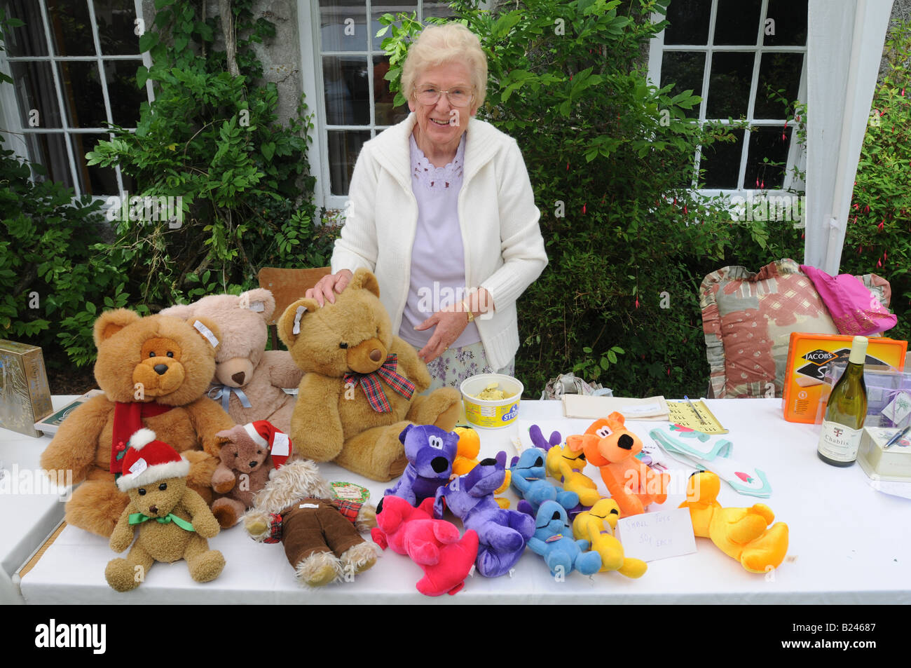 Old Lady running raffle Stock Photo - Alamy