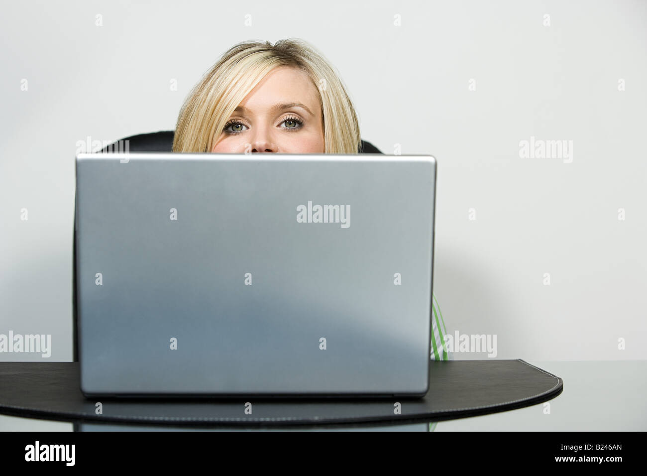 Peeking over desk hi-res stock photography and images - Alamy