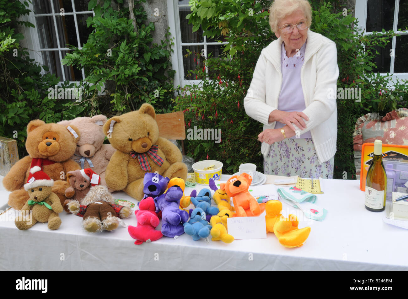 Old Lady running raffle Stock Photo - Alamy