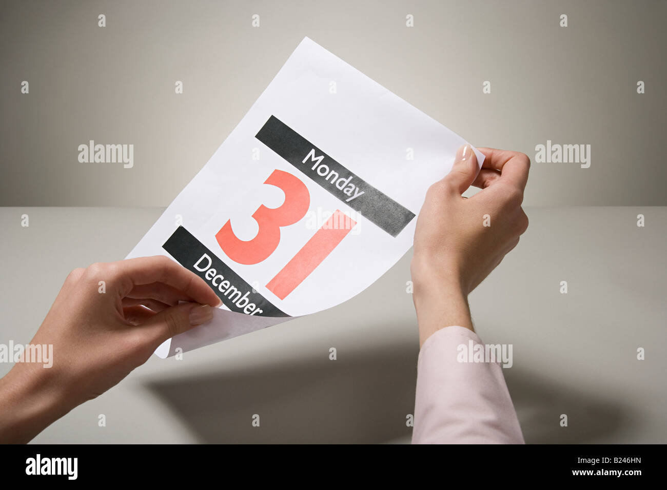 A woman holding a calendar date Stock Photo - Alamy