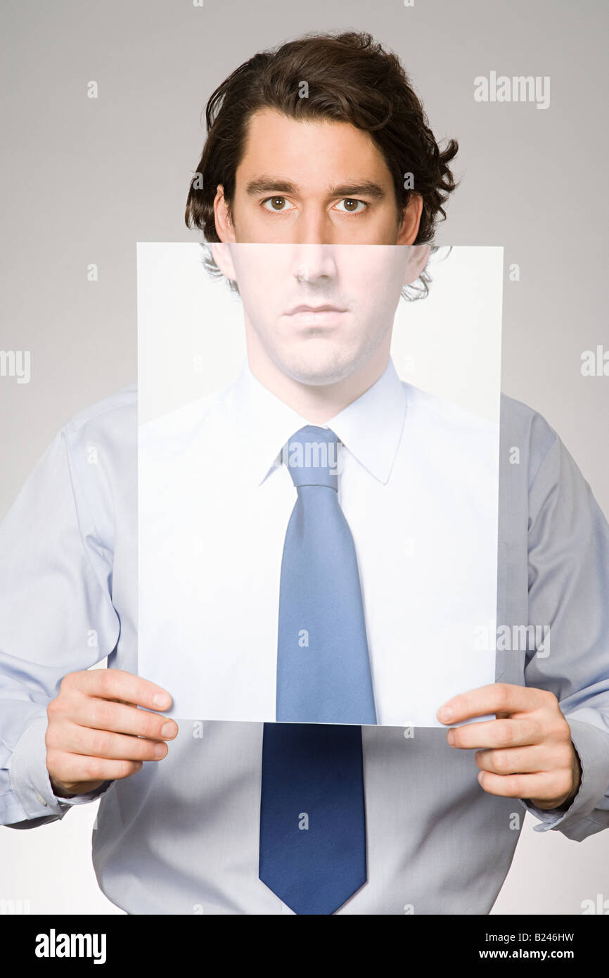 Portrait man holding photograph himself hi-res stock photography and ...