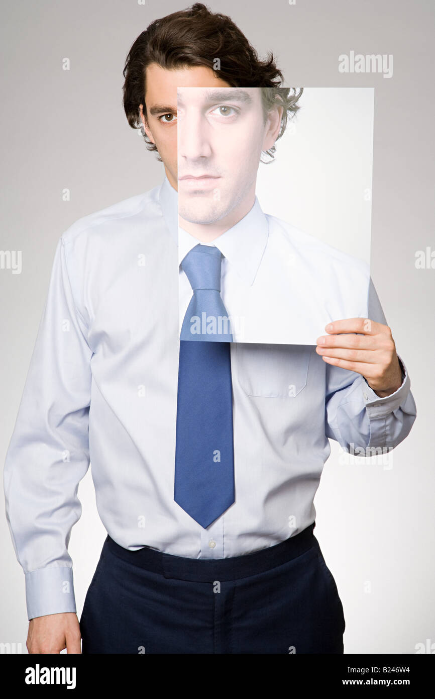 Portrait man holding photograph himself hi-res stock photography and ...