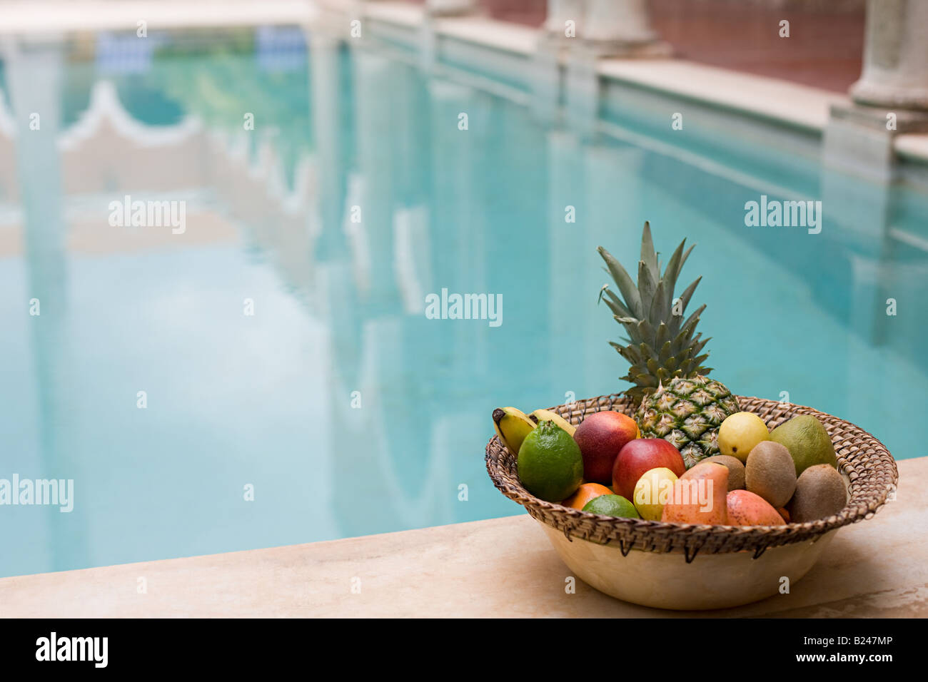 Fruit by swimming pool Stock Photo - Alamy