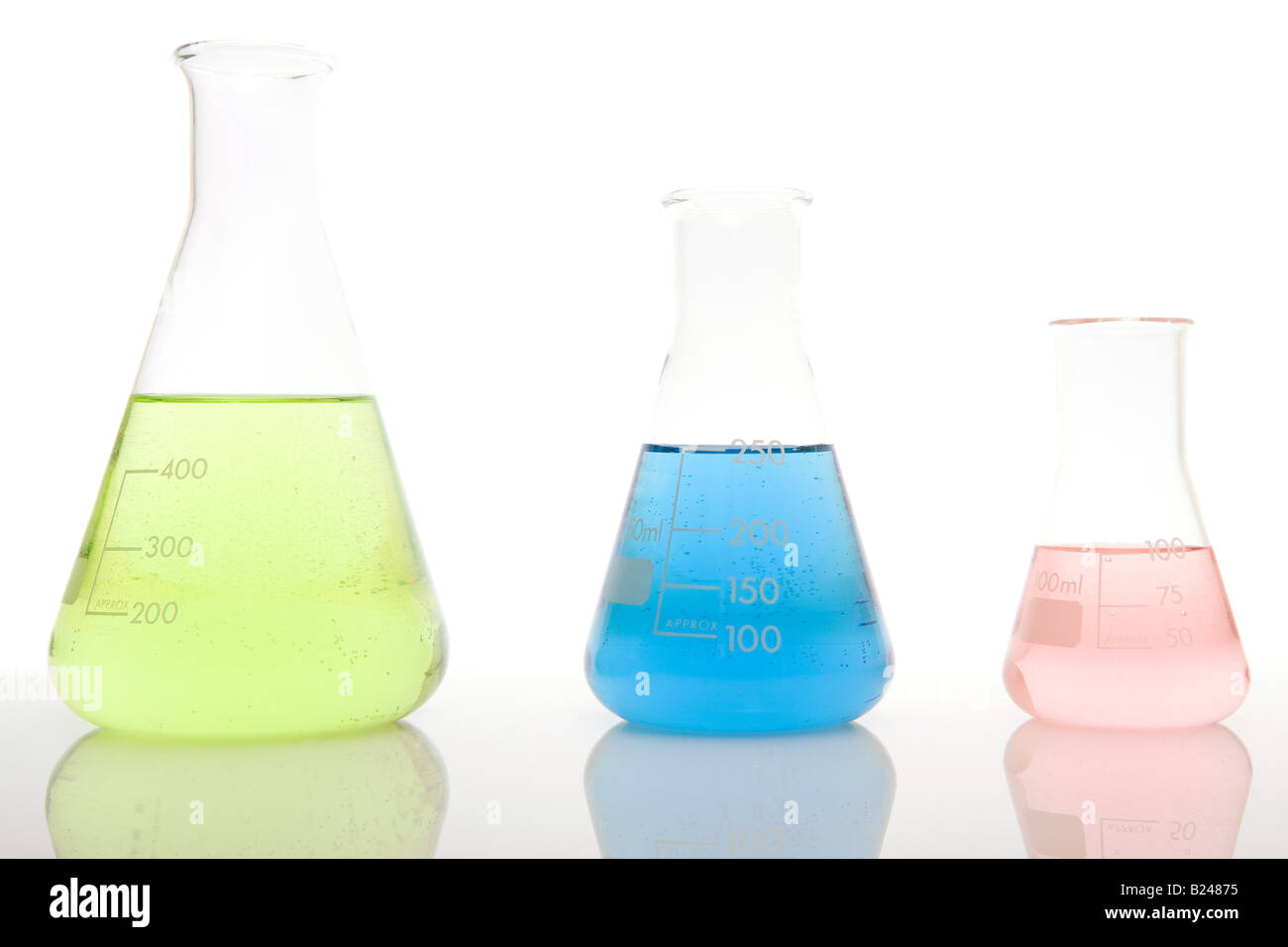 Three volumetric flasks in a row Stock Photo - Alamy