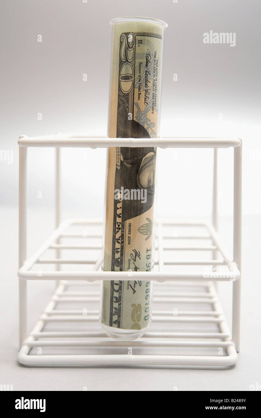 American banknote in test tube hi-res stock photography and images - Alamy