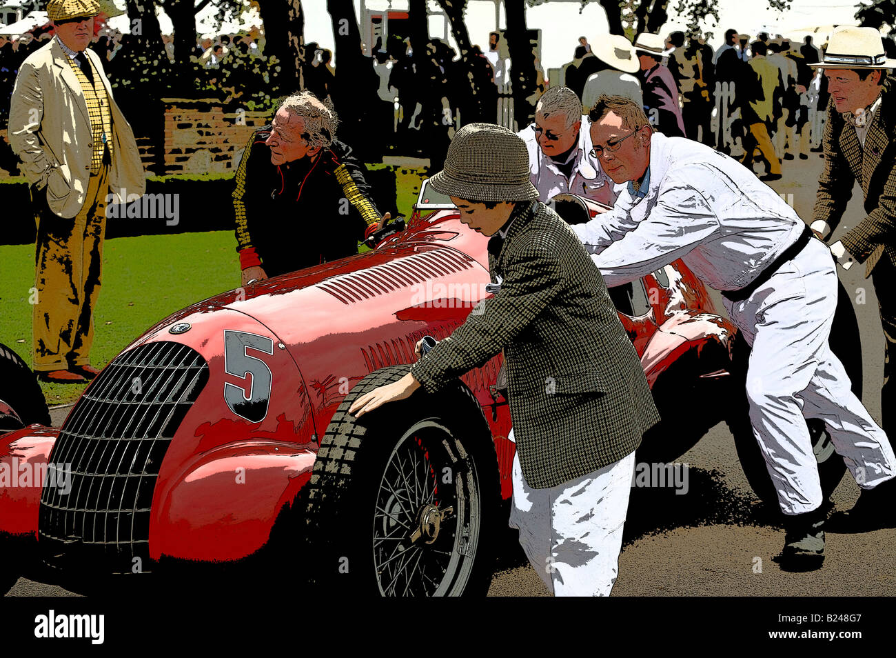 1938 Alfa Romeo 308C is wheeled through the paddock in preparation for ...