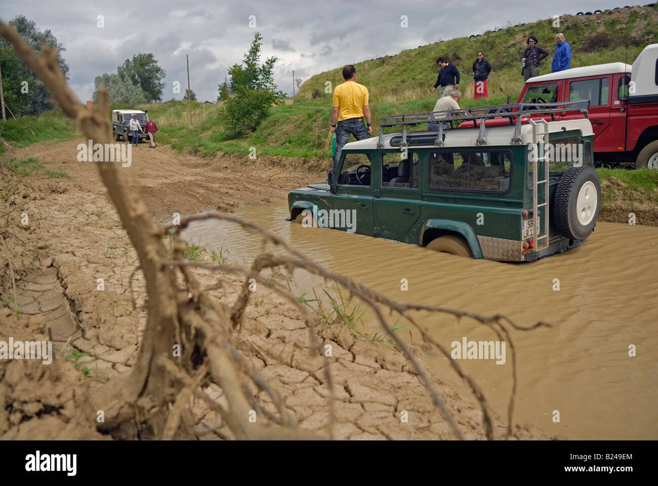 Awaiting recovery for a Land Rover Defender stuck in a puddle while off ...